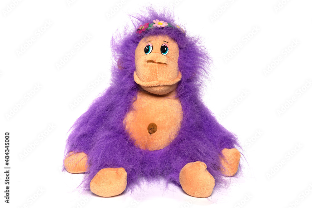 Purple plush toy monkey isolated on white. Stock Photo | Adobe Stock