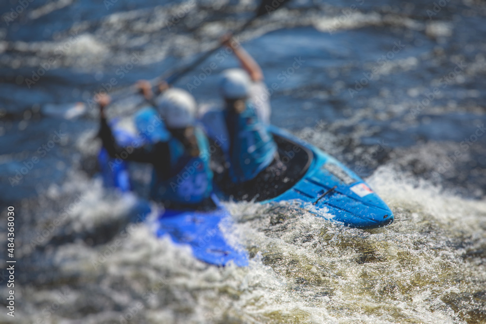 Foto de Kayak slalom canoe race in white water rapid river, process of ...