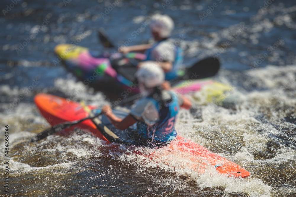 Kayak slalom canoe race in white water rapid river, process of kayaking ...