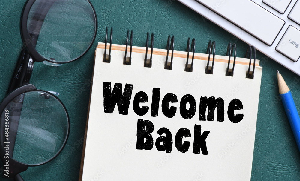 Welcome back words written down in an office notebook. Stock Photo ...