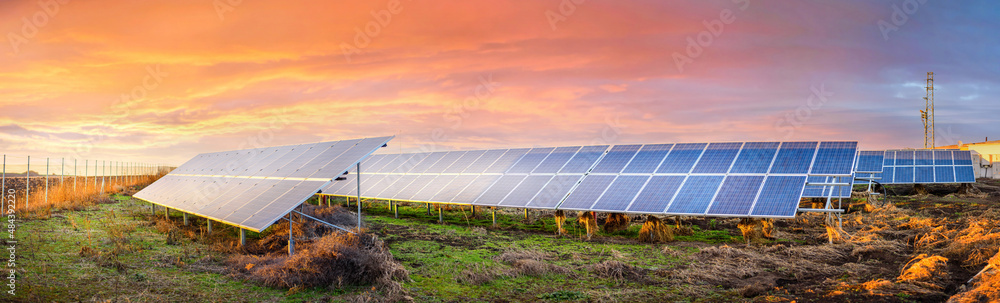 Solar panels on sunset. Industrial landscape with photovoltaic power ...