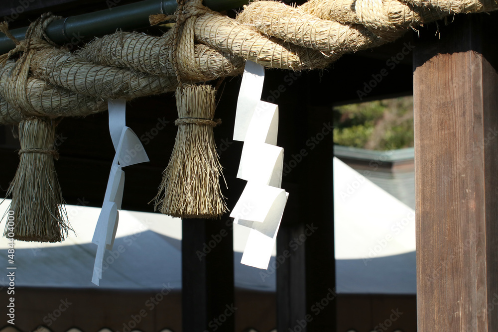 Japanese shrine decoration, "Shimenawa Shide" photo taken under the sun ...