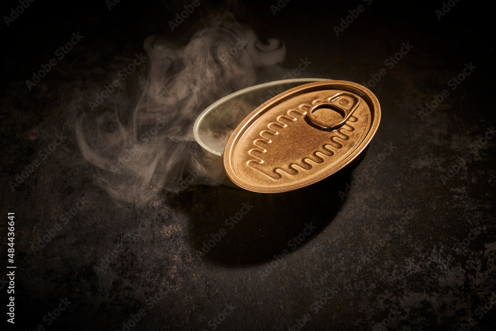 Opened tin can with smoke Stock Photo | Adobe Stock