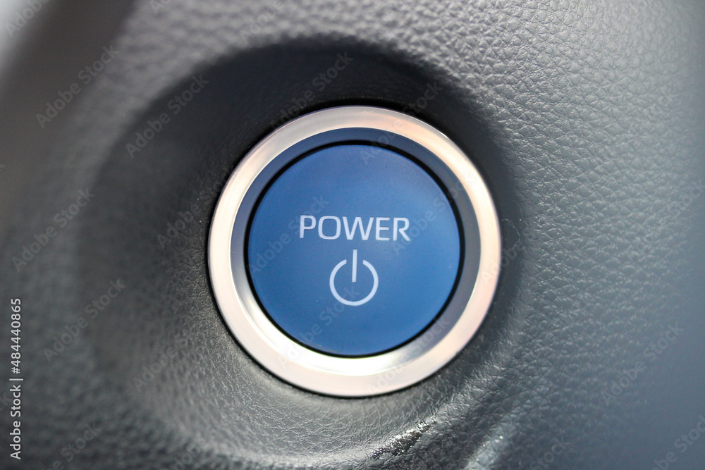 Blue power button in a new hybrid vehicle Stock Photo | Adobe Stock