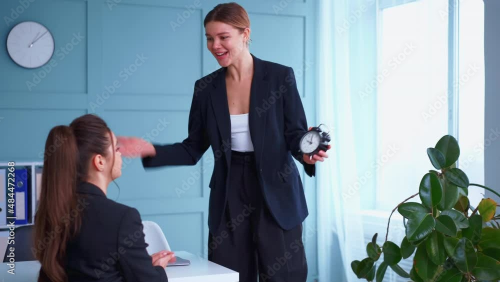 Late for work. Boss screaming at frustrated employee, showing clock ...