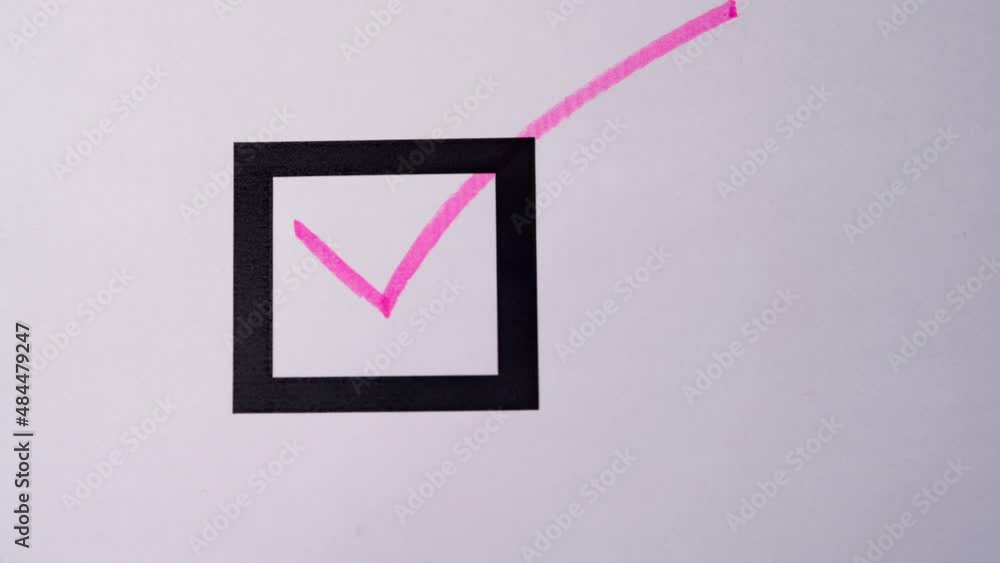 Hand with a red pen ticks checkbox marks filling up to do list. Check ...