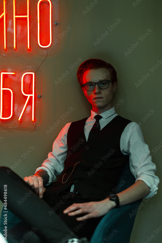 Fashionable handsome englishman red-haired guy with glasses in business ...
