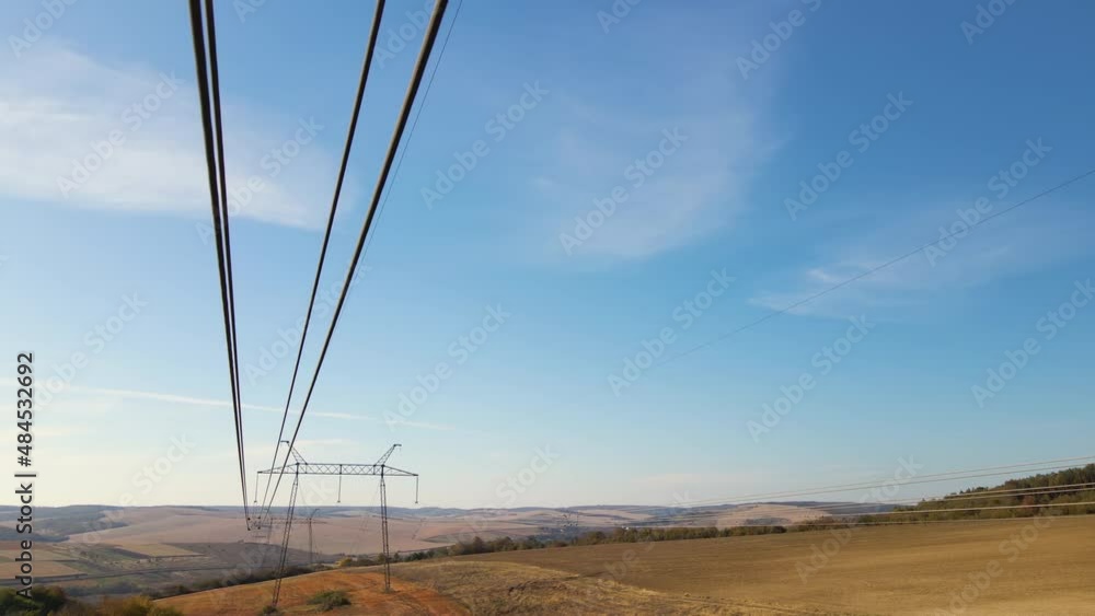 Electric power lines divided by safe guard insulating frame transfening ...