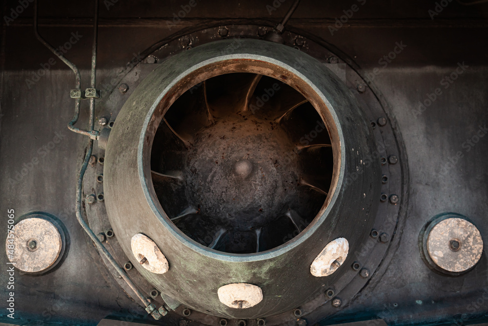 The back of a yacht with a water jet engine in the form of a turbine ...