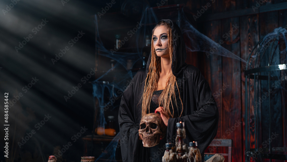 Halloween concept. Witch portrait close up with dreadlocks looking away ...