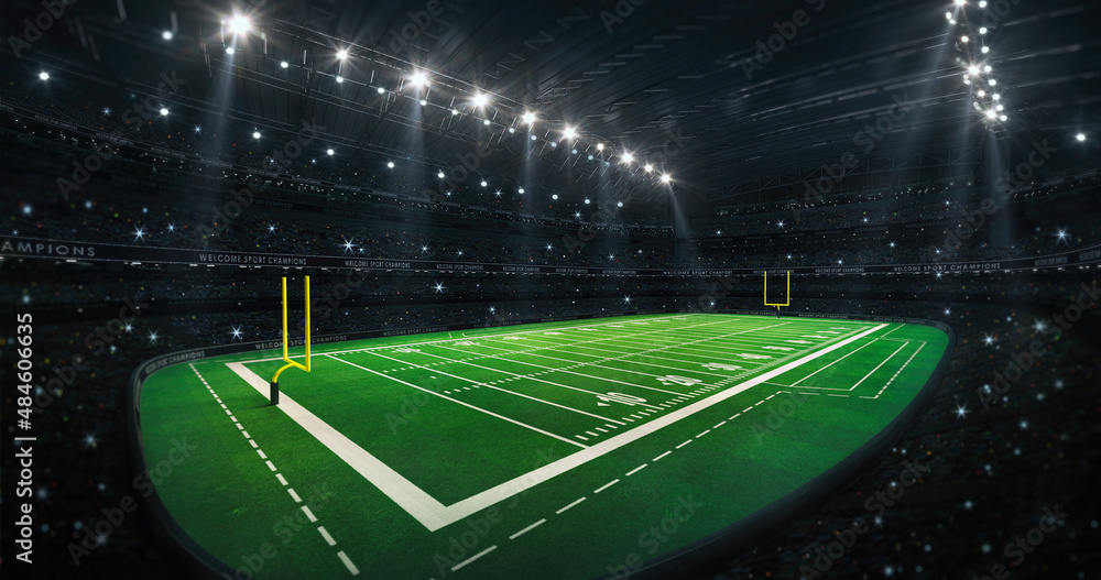 American football stadium with yellow goal posts, grass field and fans ...
