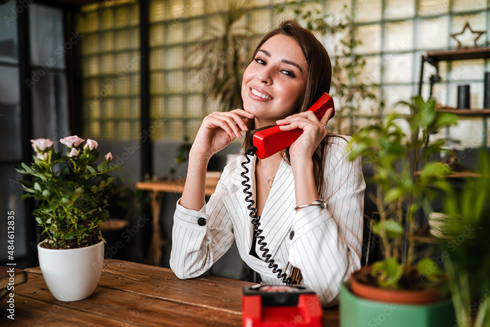 Girl holding a telephone red receiver of an old landline phone Stock ...