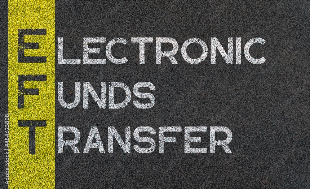 Electronic funds transfer (EFT), EFT acronym written over road marking ...