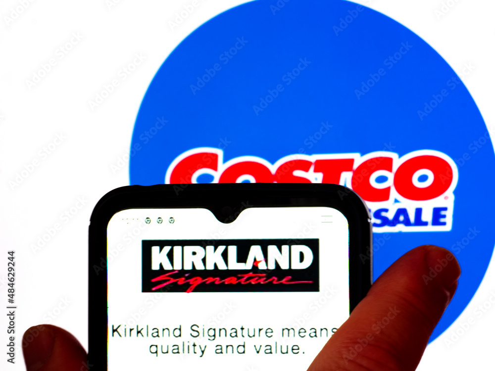 In this photo illustration, the Kirkland Signature logo is displayed on ...