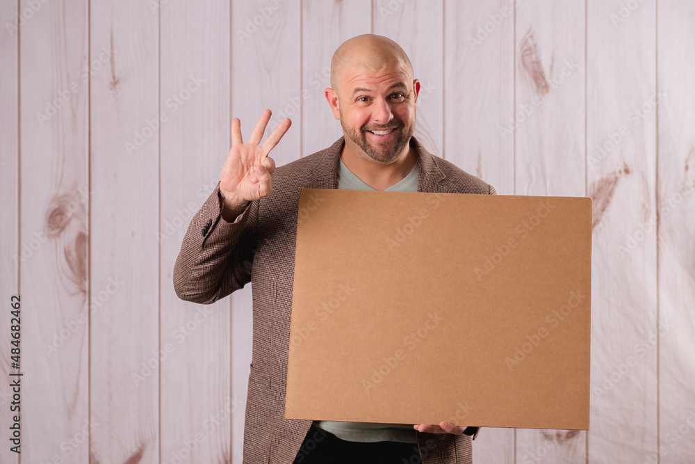 business man holding up a cardboard sign blank making gestures and ...