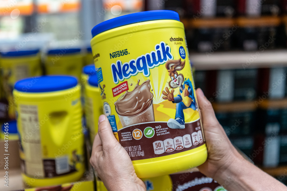 Sacramento, CA/USA 08/30/2019 Shopper's hand holding a plastic ...