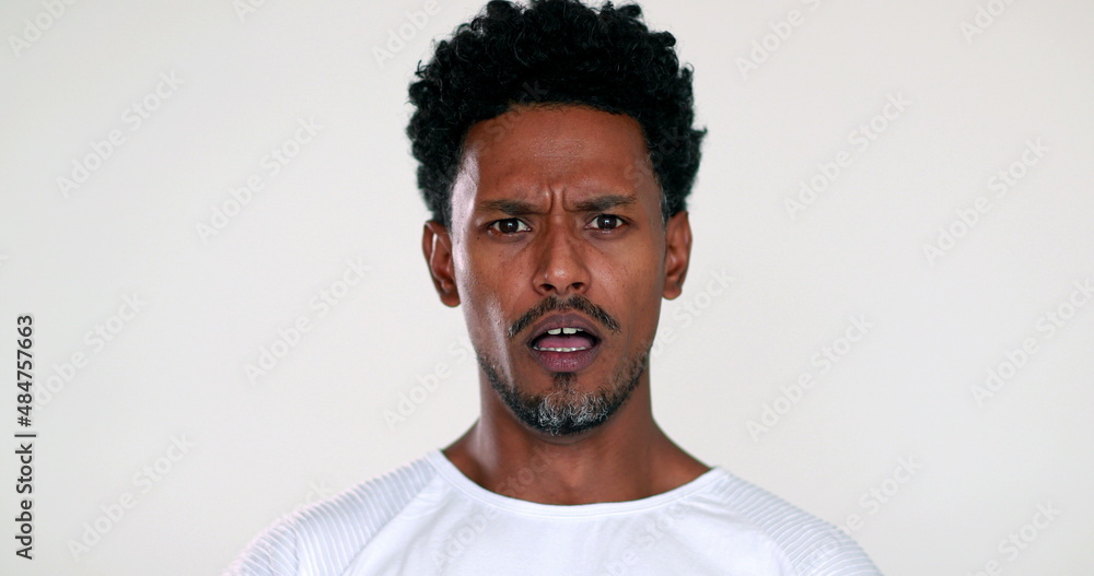 African man reacting shock surprise tense reaction face emotion Stock ...