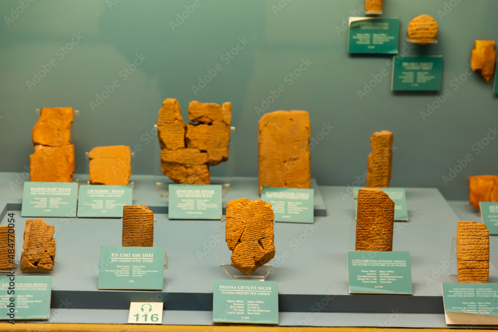 ISTANBUL, TURKEY - JANUARY 1, 2021: Clay tablets with cuneiform writing ...