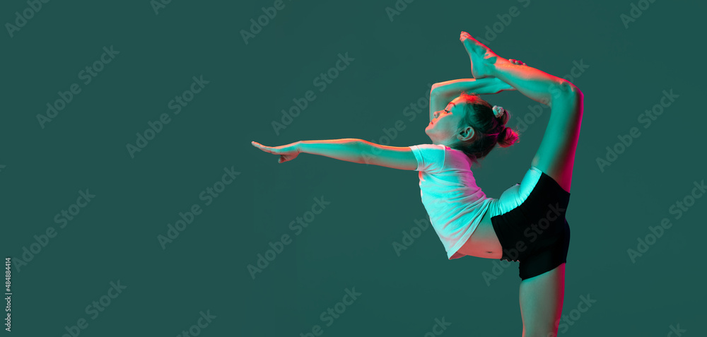 Little flexible girl, rhythmic gymnastics artist training isolated on ...