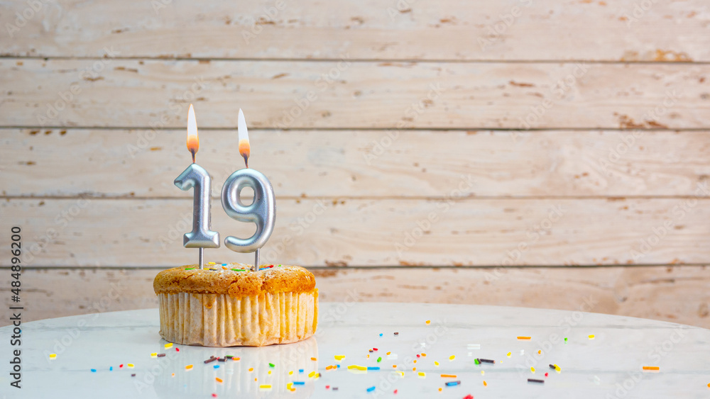 Happy birthday greetings for 19 years old from silver numbers against ...