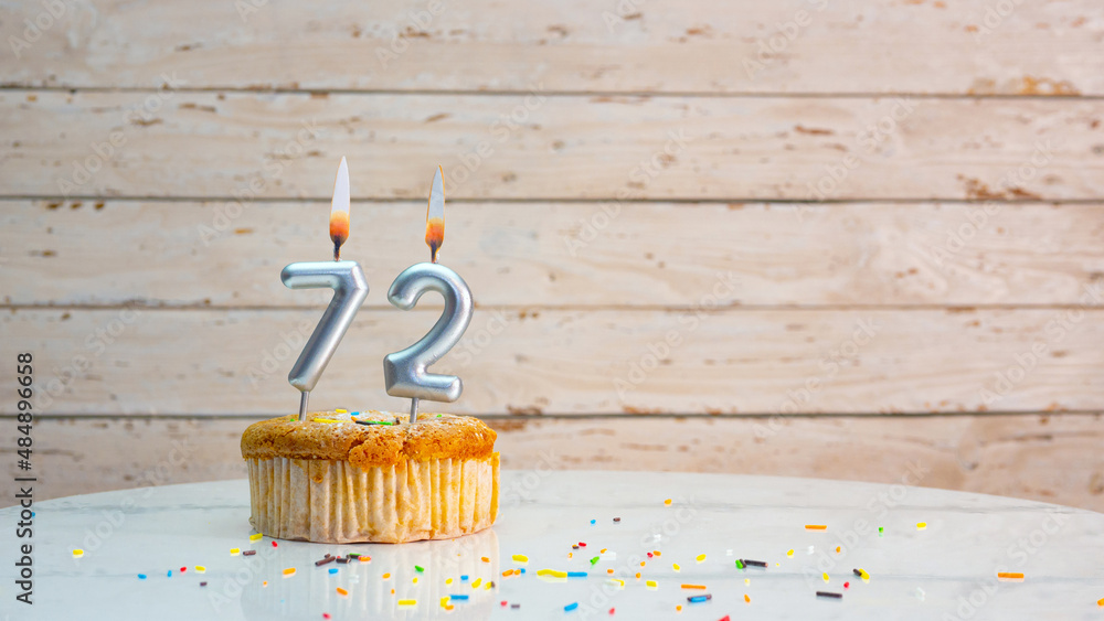 Happy birthday wishes for 72 years from silver numbers on white boards ...