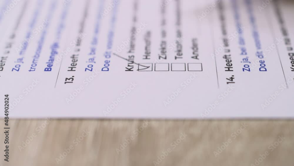 Hand with a pencil ticks checkbox marks filling up to do list. Check ...