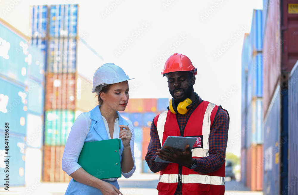 Foreman checking and control loading containers box in import-export ...