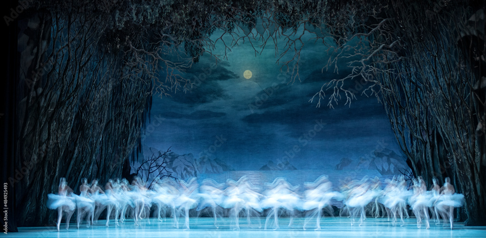 Classical ballet on stage of Theater. Ballet dancers on stage dance ...