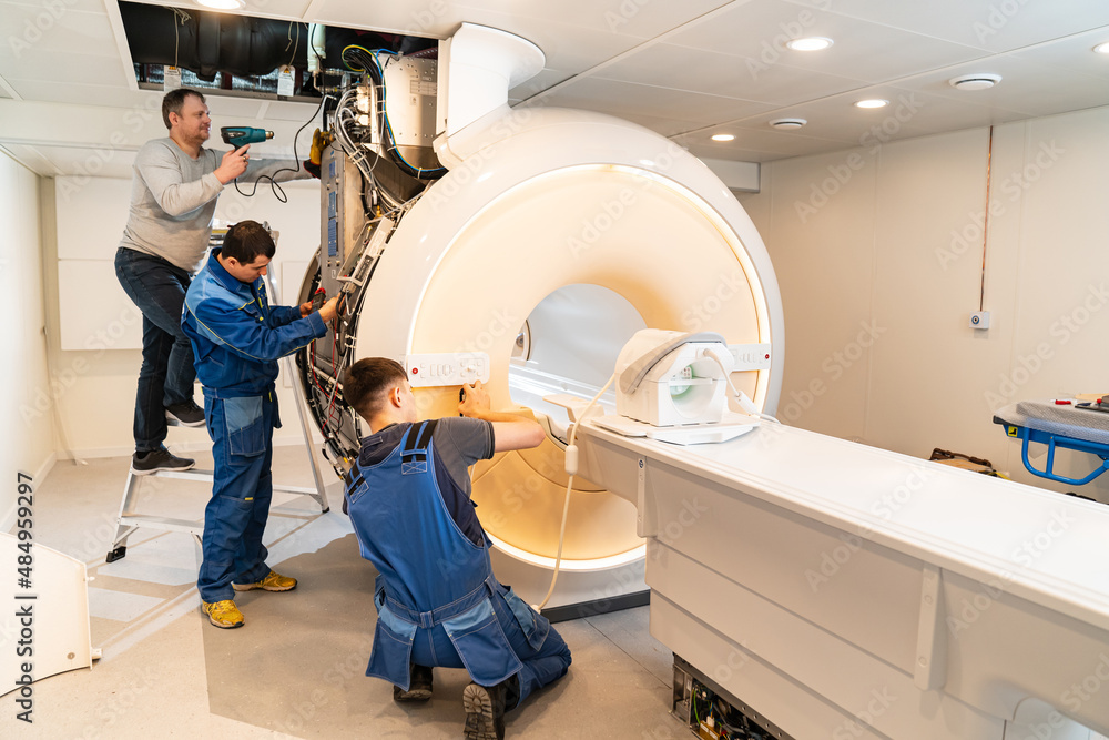 engineers of the magnetic resonance imaging apparatus configure the ...