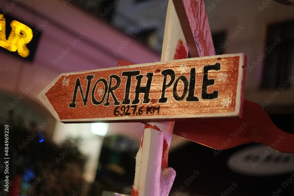 Snow covered sign pointing to the North Pole santa Stock Photo | Adobe ...