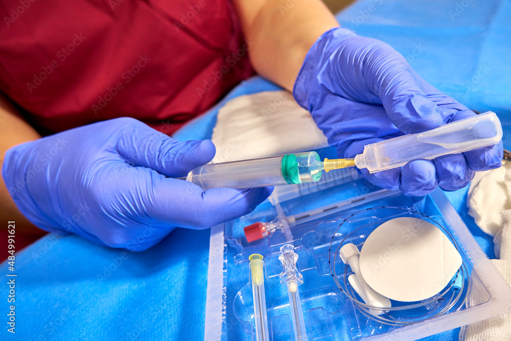 Preparation for regional anesthesia. Injection of anesthetic into a ...