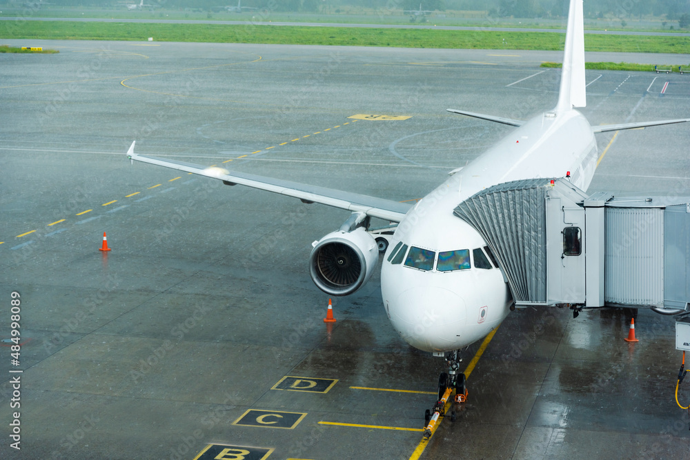 Airplane plane at terminal gate ready for boarding. Passenger boarding ...