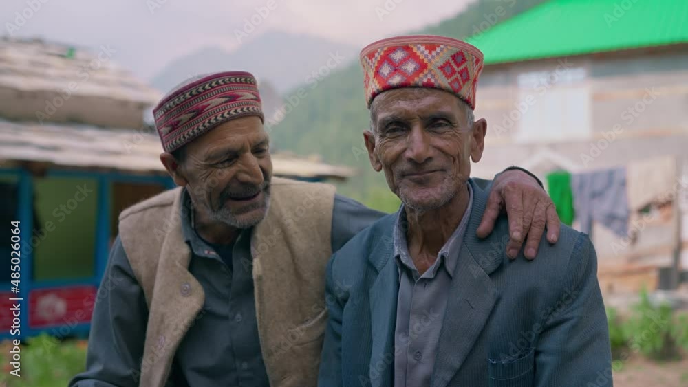 Two happy smiling elderly or old rural Indian male friends or men in ...