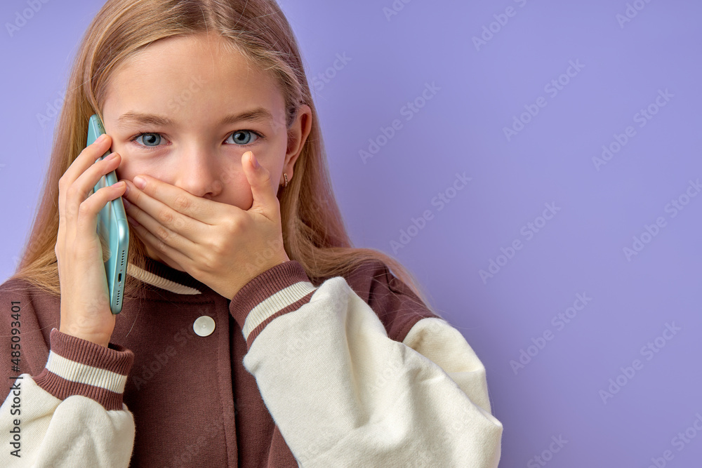 Young caucasian girl having conversation talking on smartphone over ...