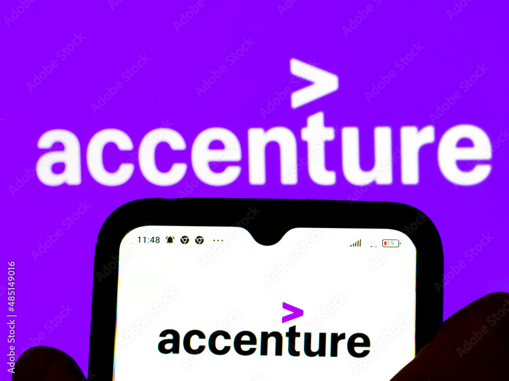 In this photo illustration, the Accenture logo is displayed on a ...