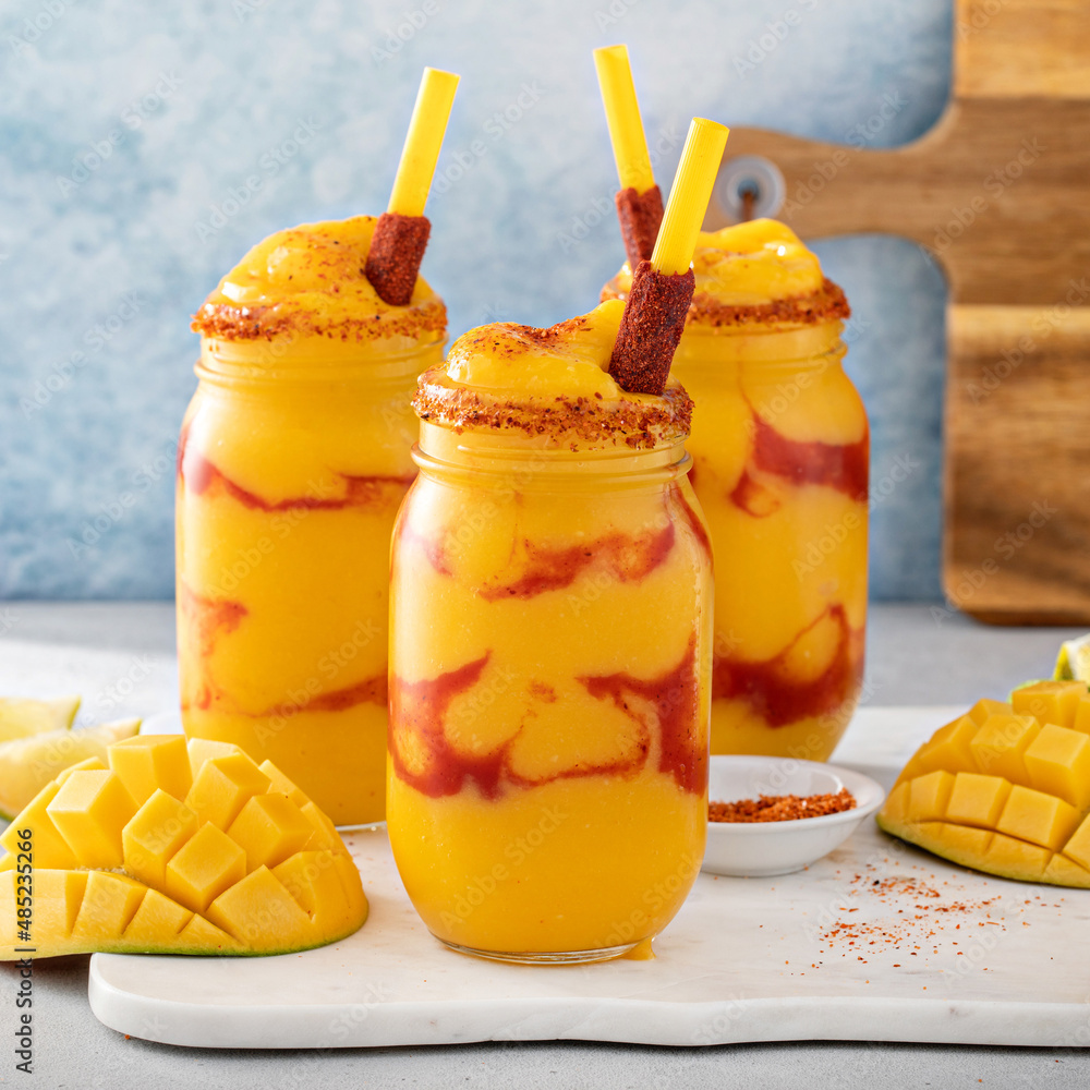 Mangonada mexican mango smoothie with chamoy sauce and lime seasoning ...