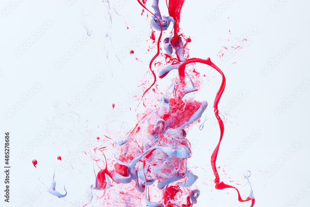 Beautiful paint splash curves in water on white. Acrylic paint drop ...