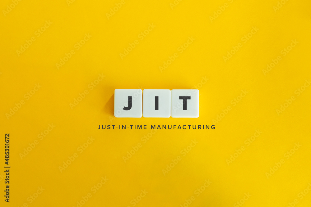 JIT (just-in-time manufacturing) Banner. Letter tiles on bright orange ...