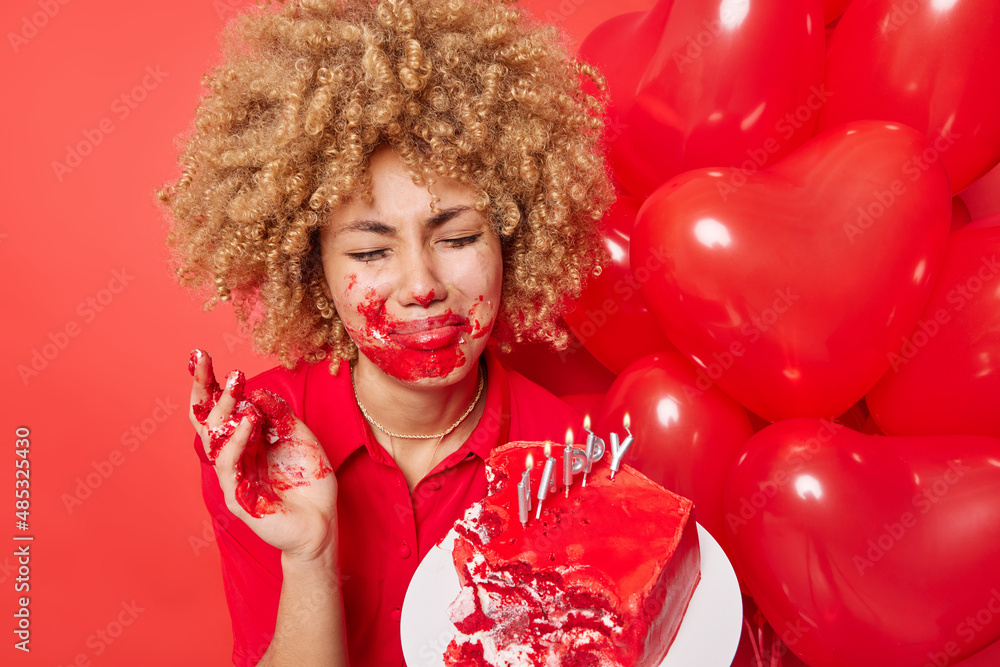 Discontent curly haired young woman upset to be lonely on Valentines ...