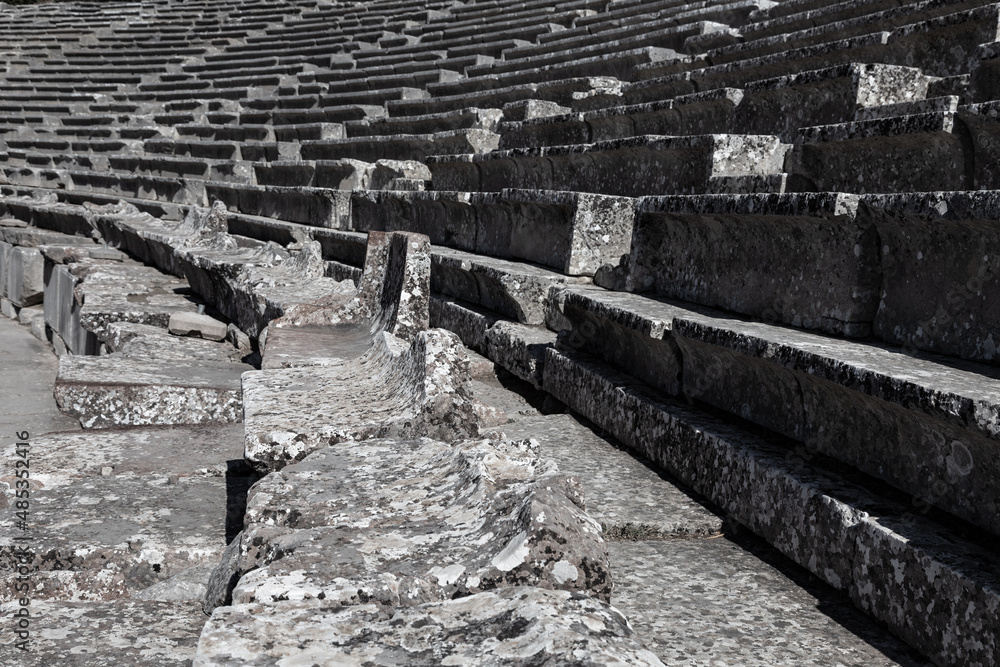 Stone seats in well-preserved giant ancient Greek theatre, Epidaurus ...