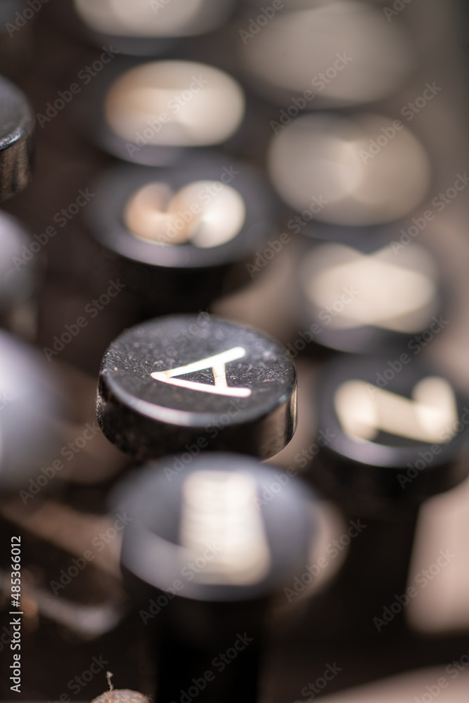 Vintage / old typewriter. QWERTY -keyboard, narrow field of depth ...