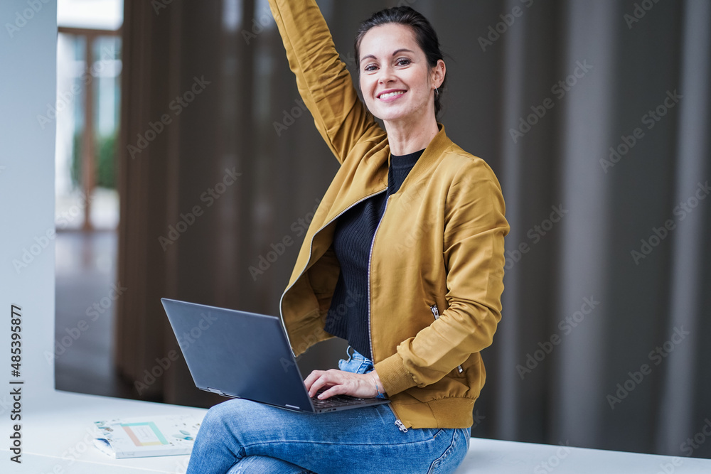 happy smiling remote working woman in casual outfit sitting in cross ...