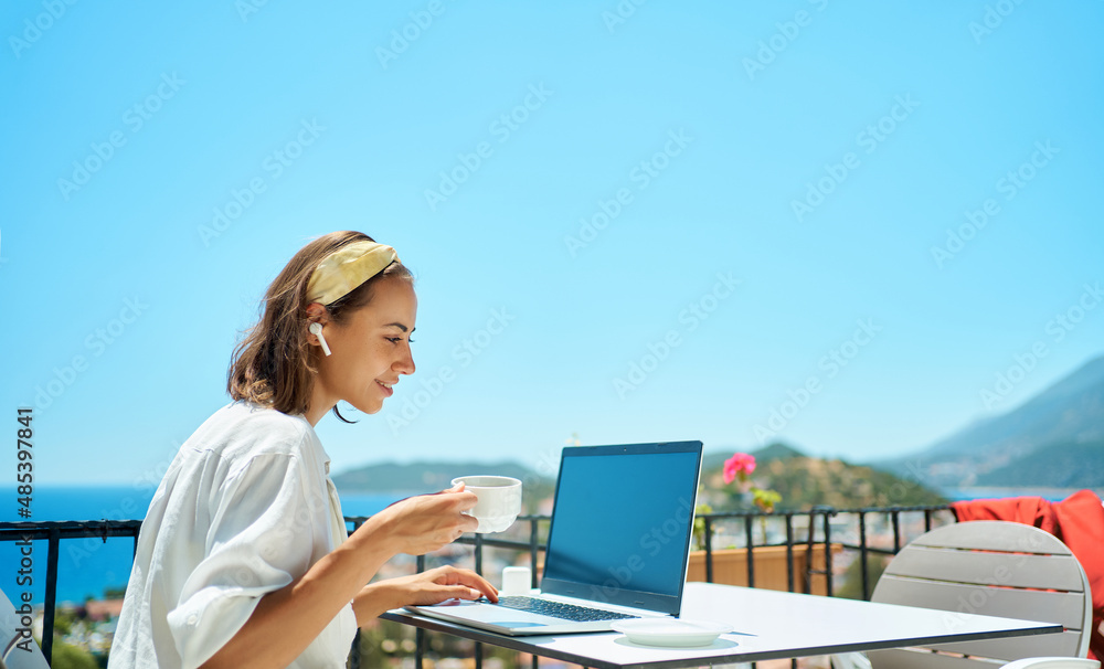 Adult beautiful woman using laptop computer typing emails sending ...