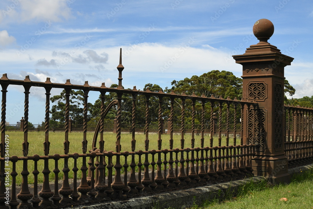 Ornate wrought iron railings surrounding heritage-listed Centennial ...