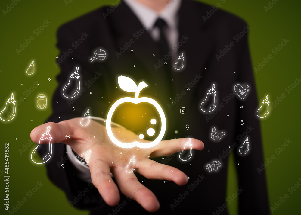 Hand holding food related icons Stock Photo | Adobe Stock