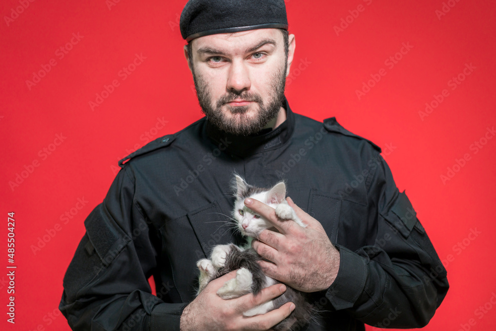 Military. Law enforcement officer with a stern look. A male security ...