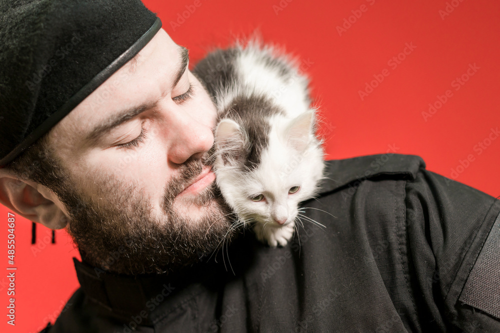 Law enforcement officer with a stern look. The bodyguard interacts with ...