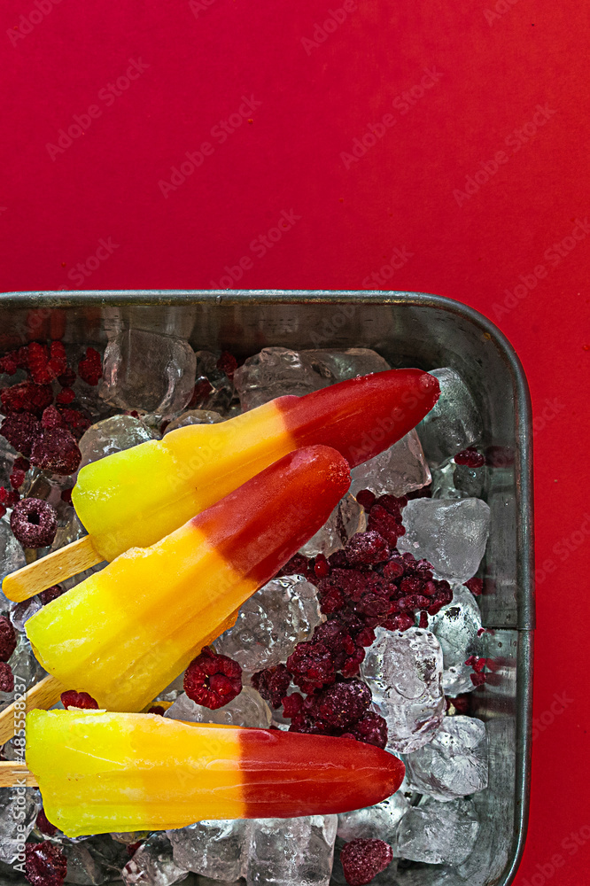 Rocket shaped ice lollies on a bed of ice Stock Photo | Adobe Stock