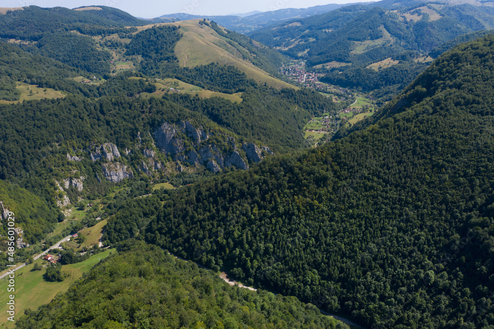 Flying above a deep valley and deciduous forest by drone Stock Photo ...