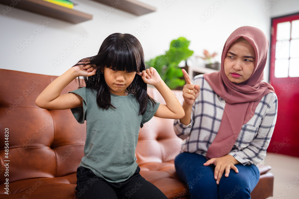 muslim mom scolds for discipline bad behaviour kid Stock Photo | Adobe ...